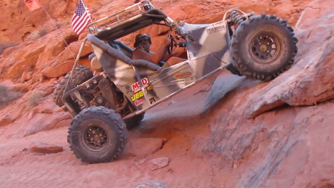 Joyner 650 custom...going up a 2 meter rock wall... - YouTube