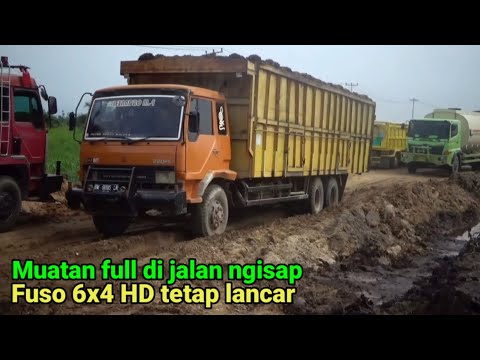 Muatan full di jalan ngisap Fuso 6x4 HD tetap handal