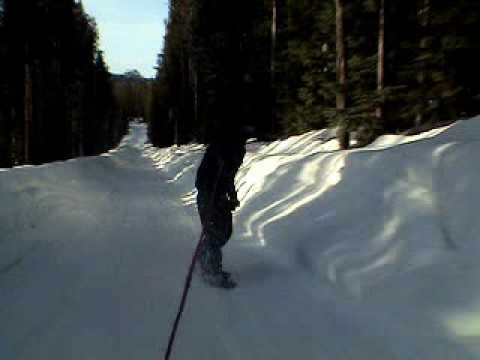 snowboarding behind snowmobile - YouTube
