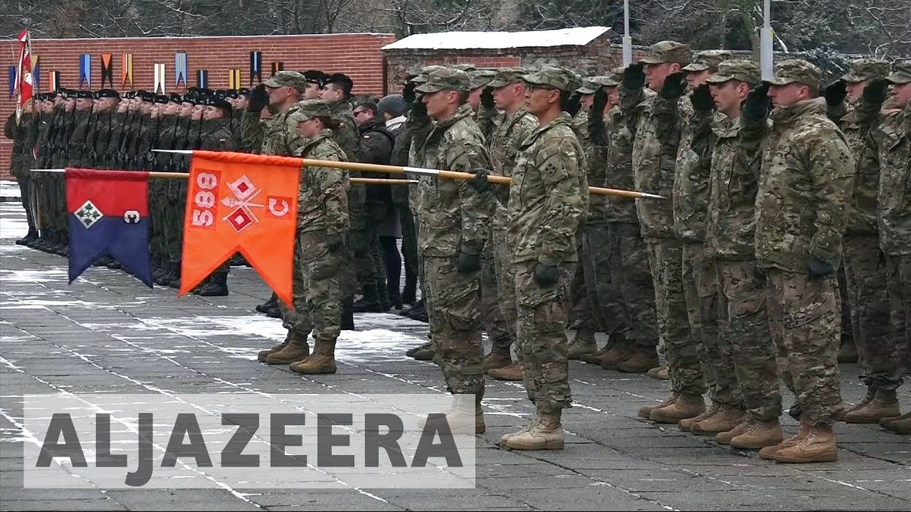 NATO troops in Poland raise US-Russia tensions - YouTube