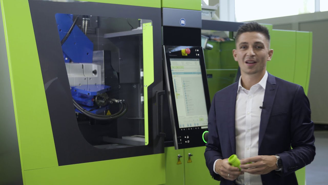 Production of T-fitting pipes on tie-bar-less injection moulding ...