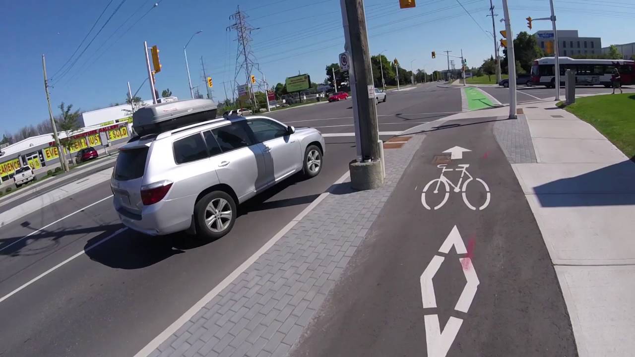 Raised cycle track, you still need to be aware - YouTube