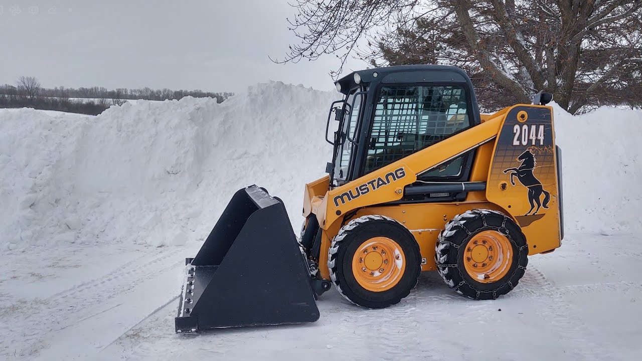 Plowing and pushing snow - YouTube