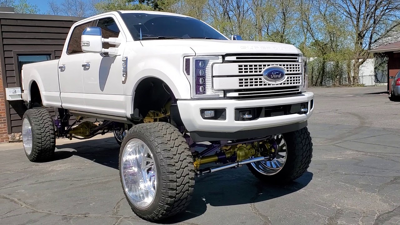 F350 platinum edition 28x14's - YouTube