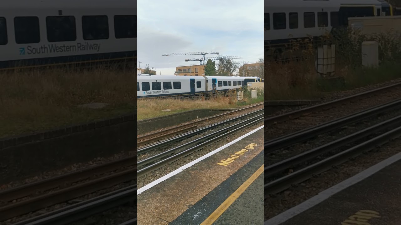 a double SWR class 444 including pride livery passing Walton on Thames ...