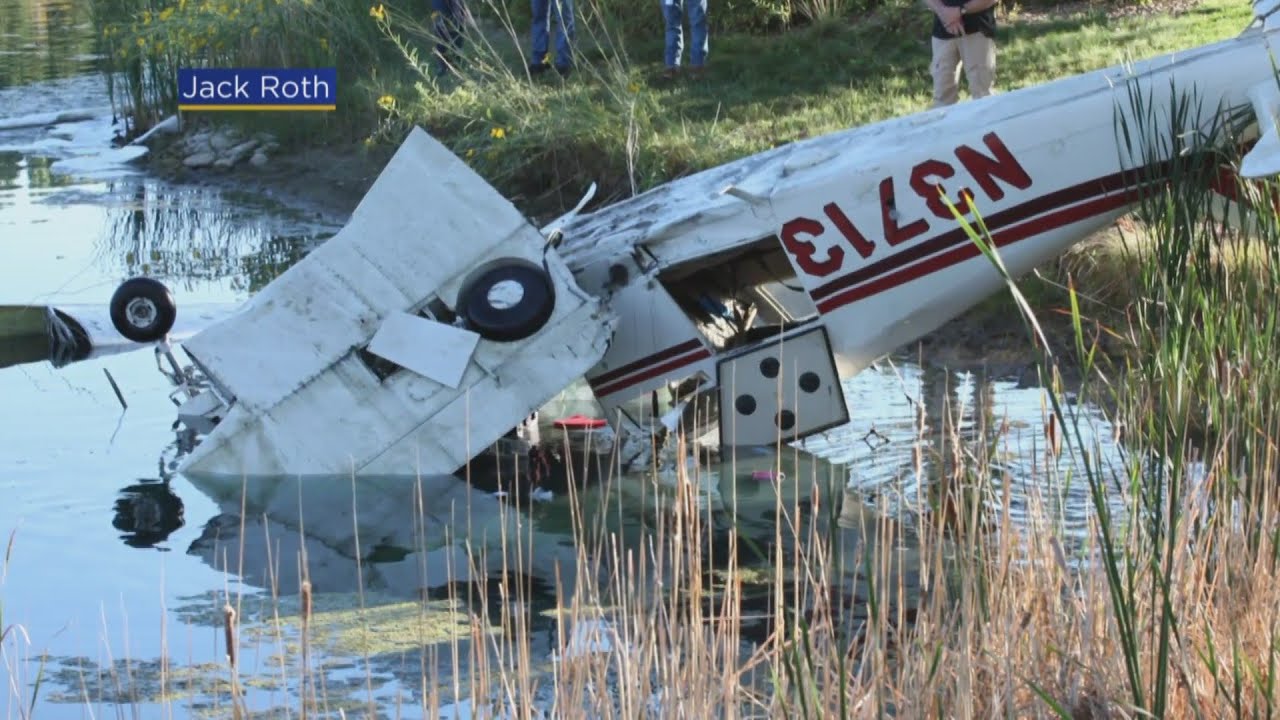 Single engine Piper Cherokee crashes into pond - YouTube