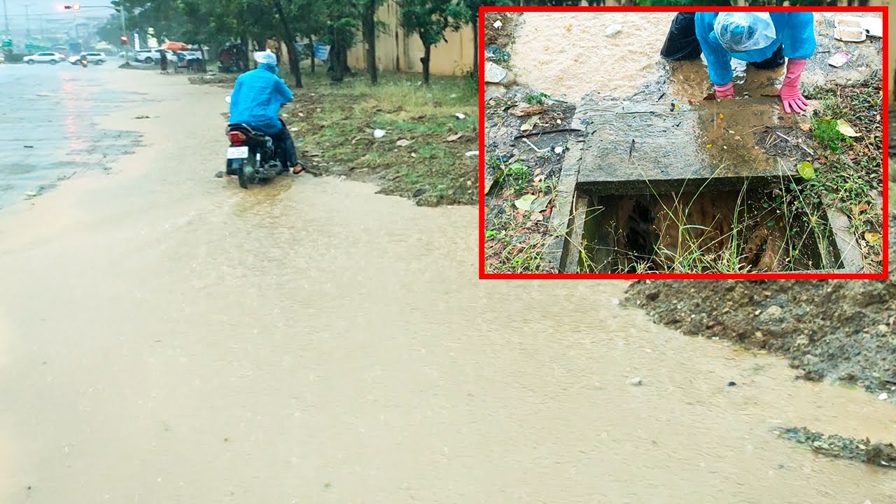 Unclogging Culvert Drain On Street Road While Heavy Rain - YouTube