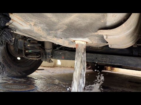 How to get water out of car spare wheel storage - YouTube