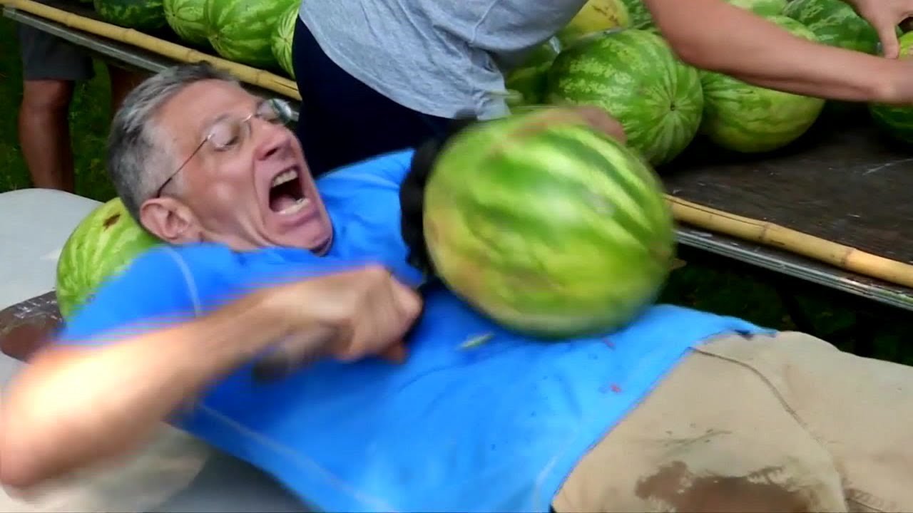 Man sets record for slicing most watermelons in half on his stomach ...
