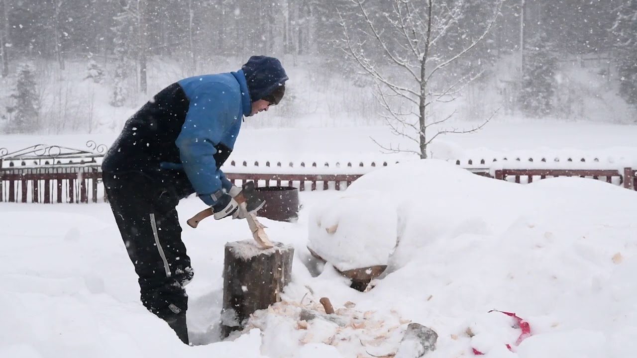 Axing a spoonblank in massive snow - YouTube