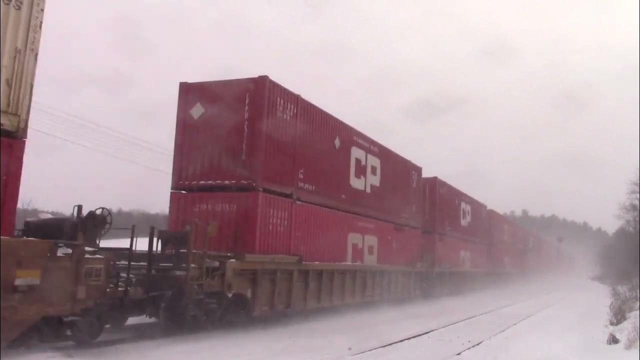 (CPKC) CP 119 with KCSM 4568 and 4506 mid DPU passing Palgrave - YouTube