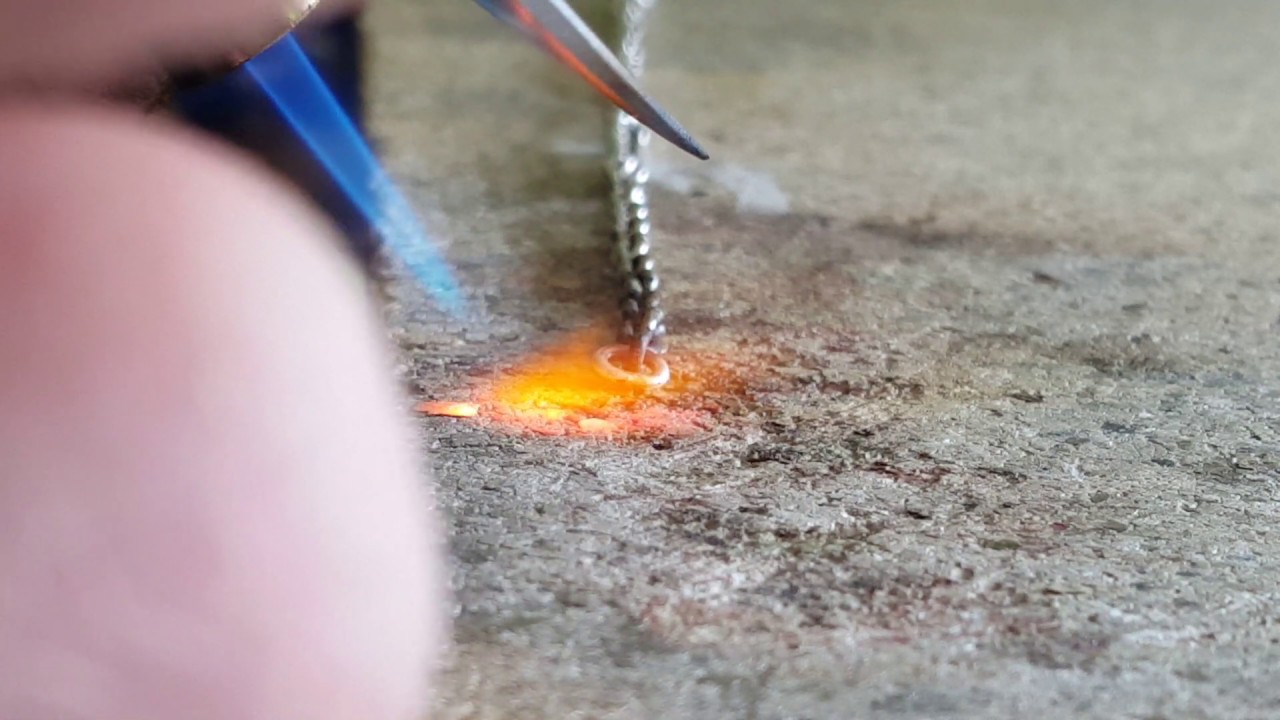 Close up of silver soldering a very small join - YouTube