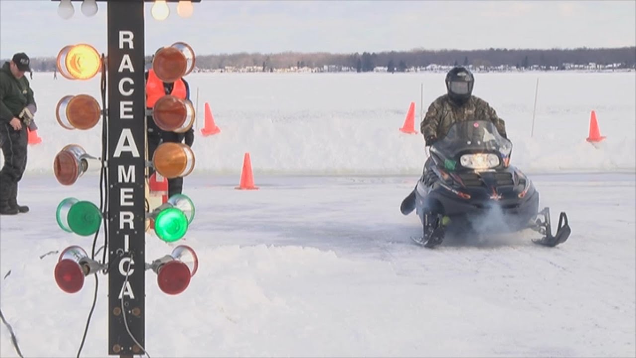 Tip-Up town kicks off with snowmobile drag races - YouTube