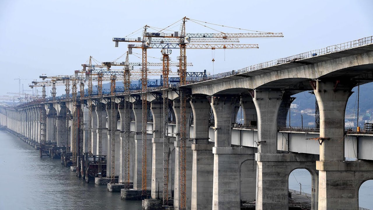 China's first highway-railway cross-sea bridge connected in east China ...