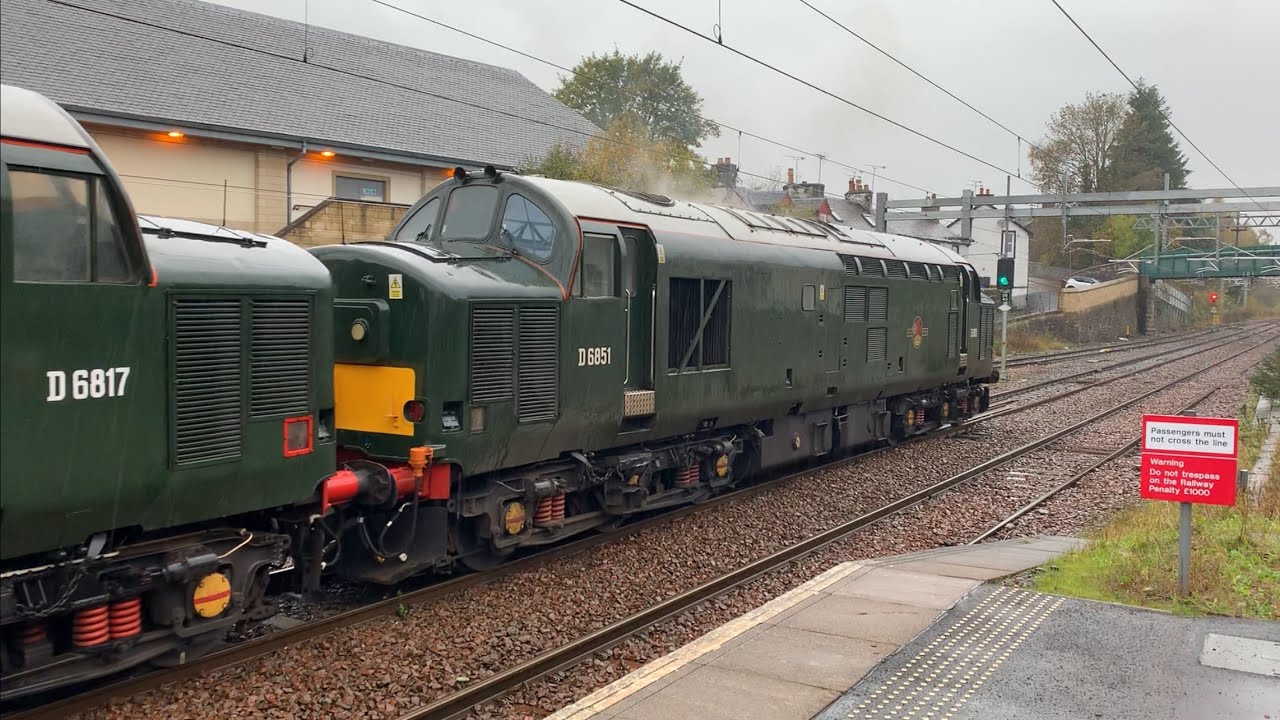 LSL 37667 (D6851) and 37521 (D6817) depart Dunblane light for Inverness ...