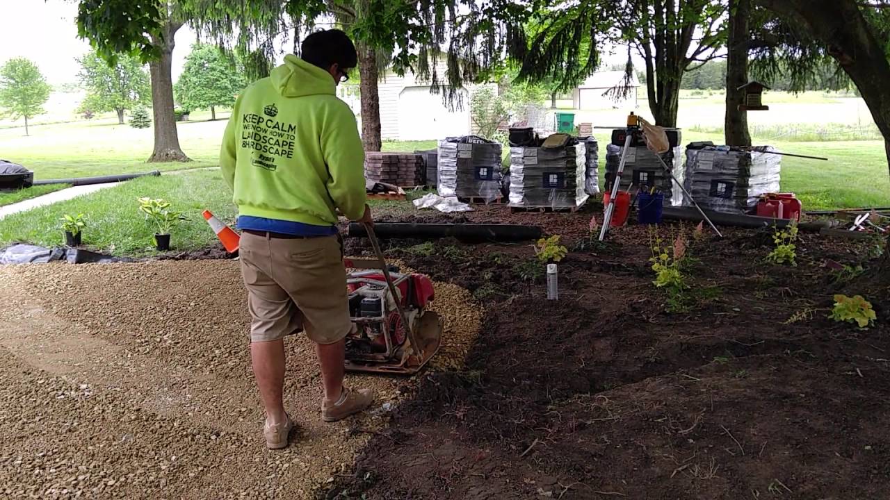 Tamping for Belgard Pavers hardscape with Stone Silver Fox plate ...
