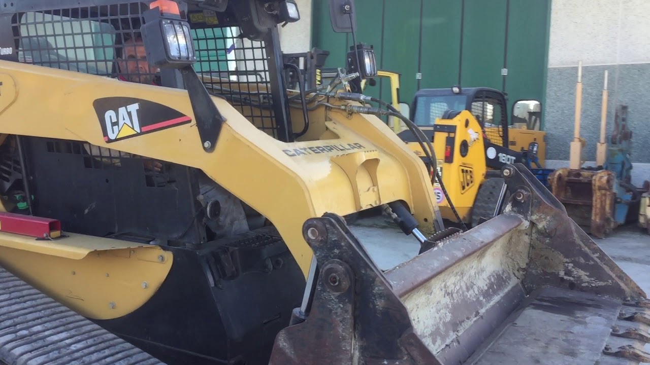 Caterpillar 287 B - YouTube