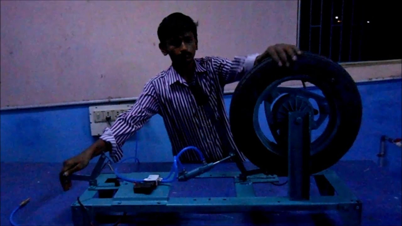 AUTOMOBILE ENGG PROJECT AUTOMATIC HAND BRAKE RELEASE HI-TECH RESEARCH ...