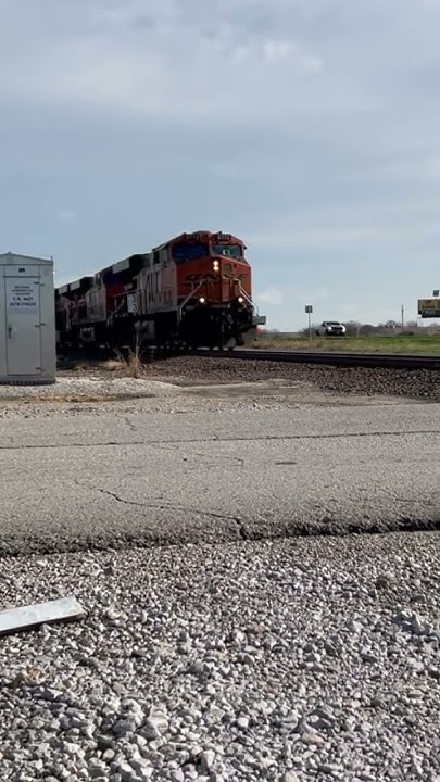 BNSF intermodal flies past - YouTube