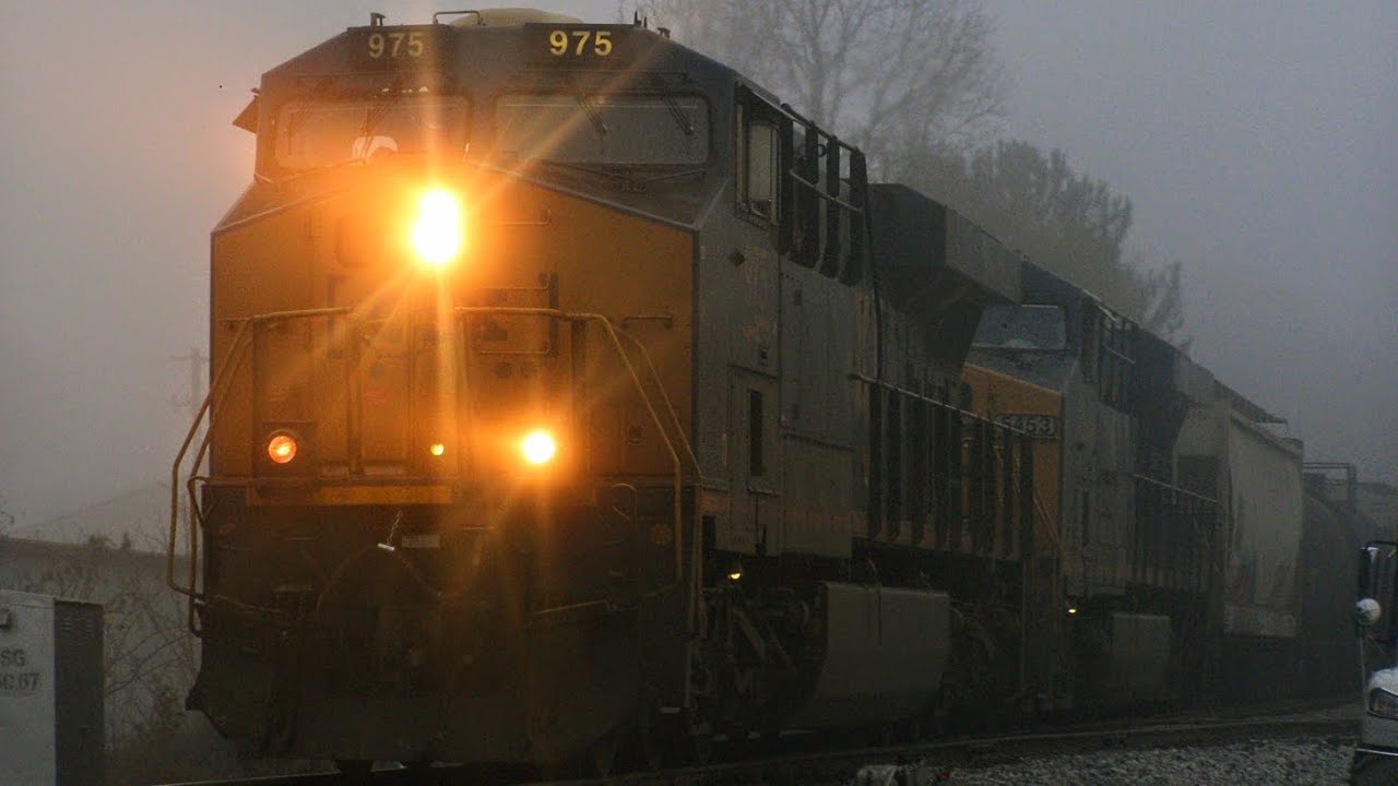 CSX 975 w Cool Crew & Strange DPU leads M583-06 in Tucker, GA. - YouTube