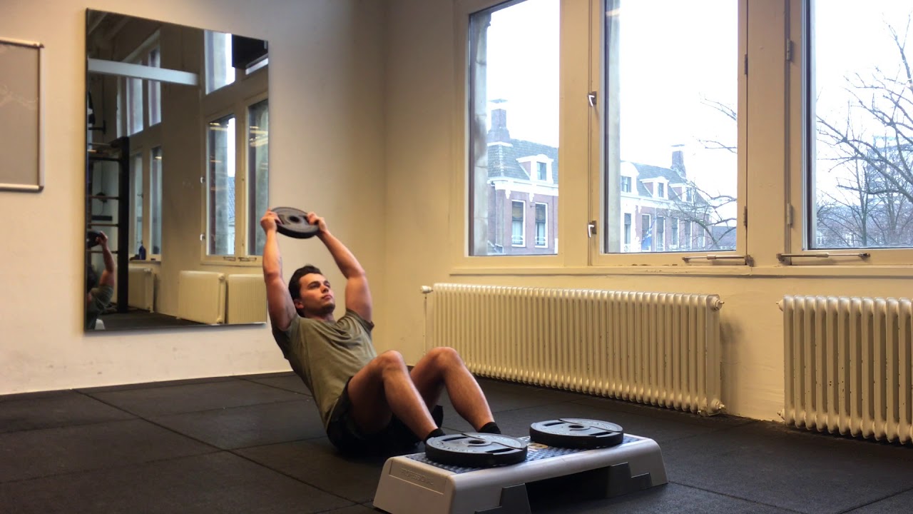 Static overhead plate crunch - YouTube