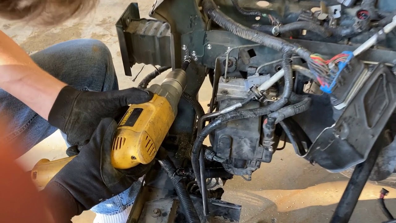 Radiator core support removal on a Mustang GT. Learn how to drill out ...