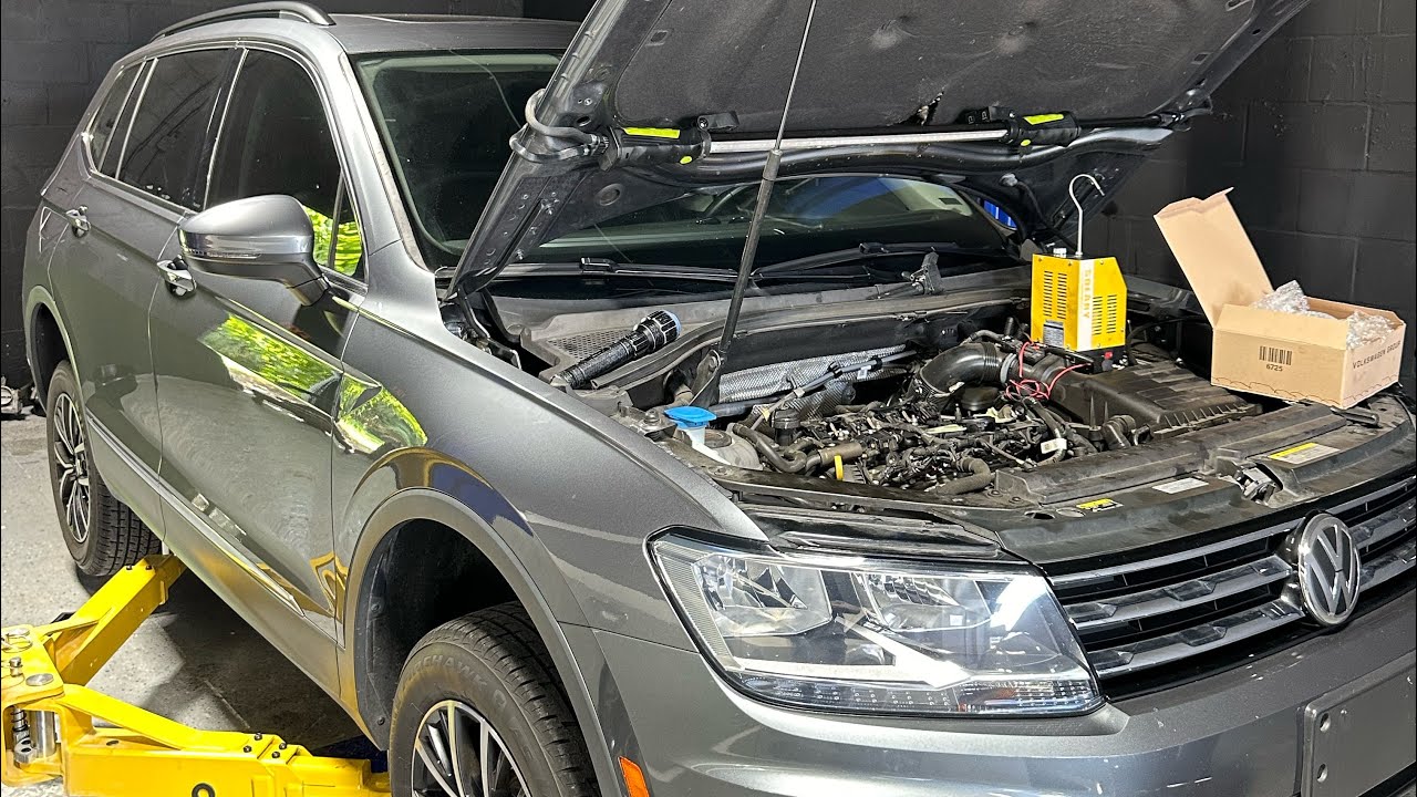 VW Tiguan com luz da injeção acesa. Queimando óleo no escape e vazando ...