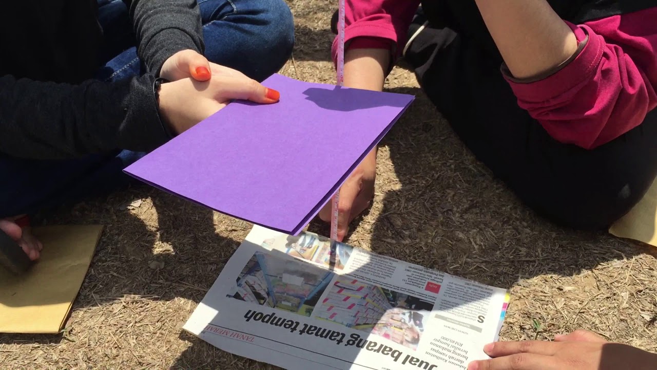 Experiment of burning holes on Paper by using Magnifying Glass - YouTube