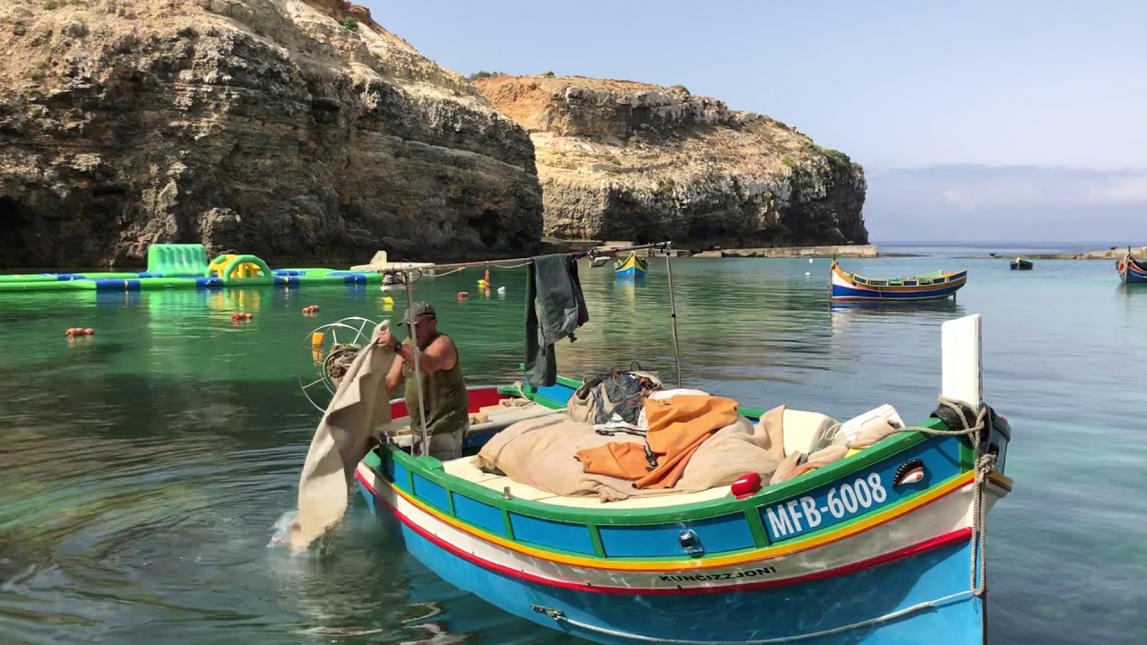 Maltese traditional boat - kajjik - YouTube