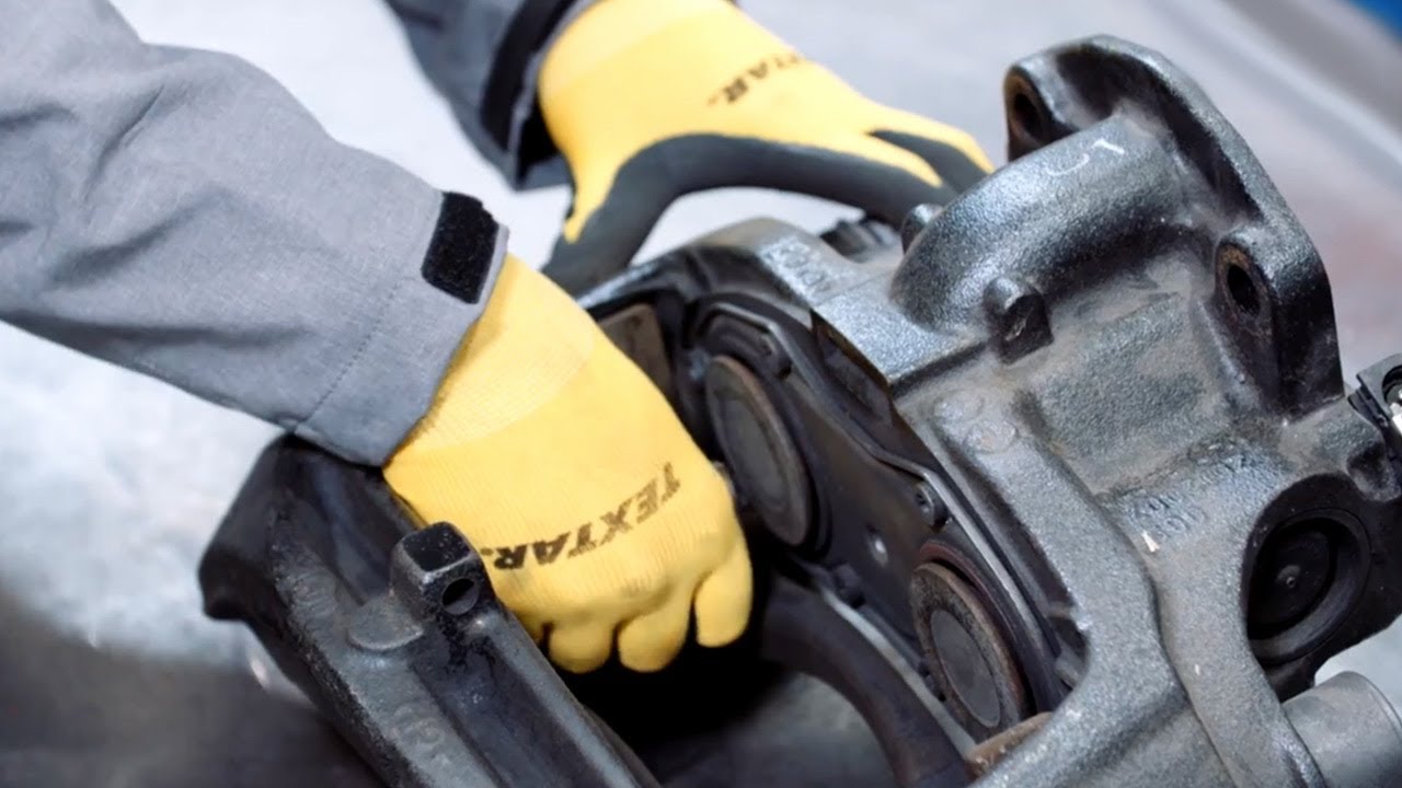 Textar Assembly of the Brake Pad & Brake Discs on the Front Axle - YouTube