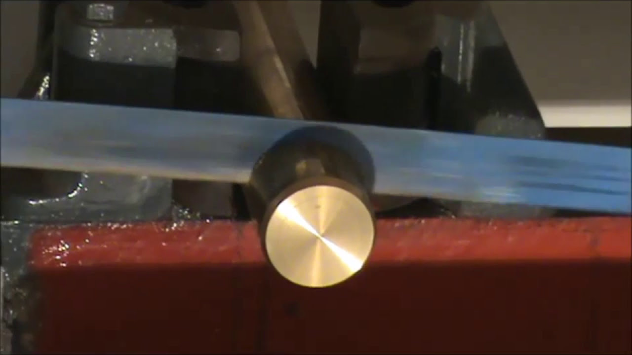 A Power Hacksaw cutting 2" brass bar - YouTube