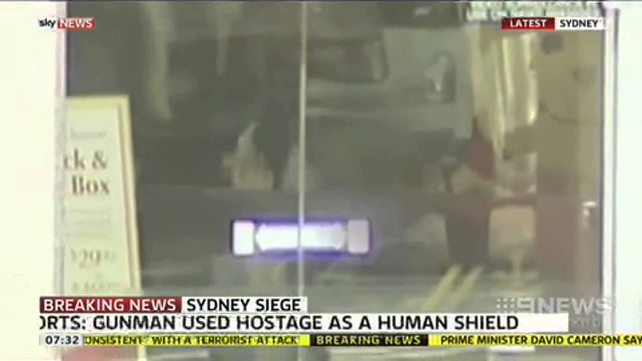 Sydney Siege: Gunman Uses Hostage As Human Shield - YouTube