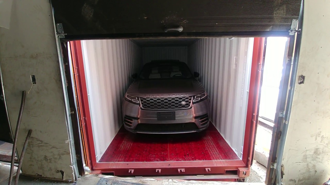 Rangerover velar into 20'' container for africa - YouTube