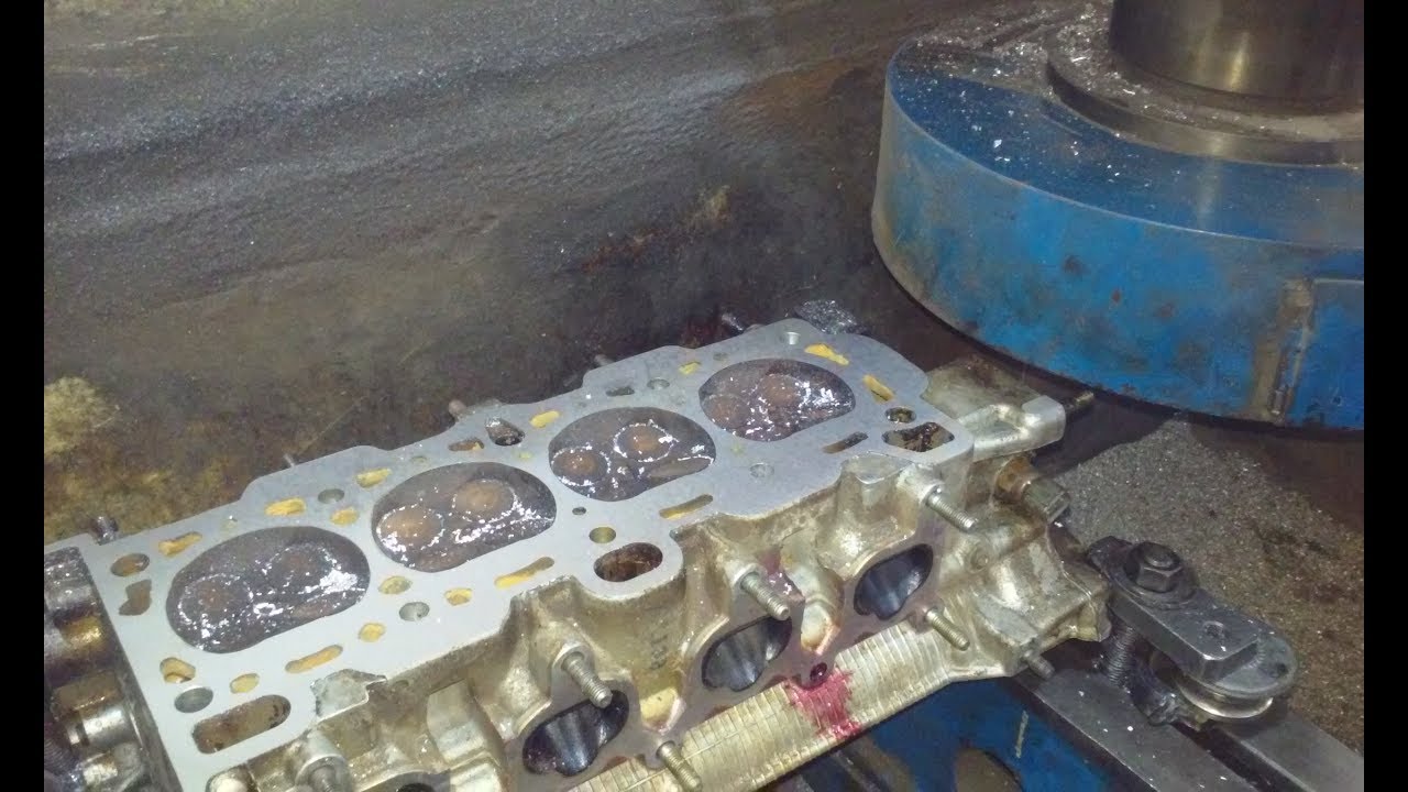 Repair the head of the car engine in the lathe - YouTube