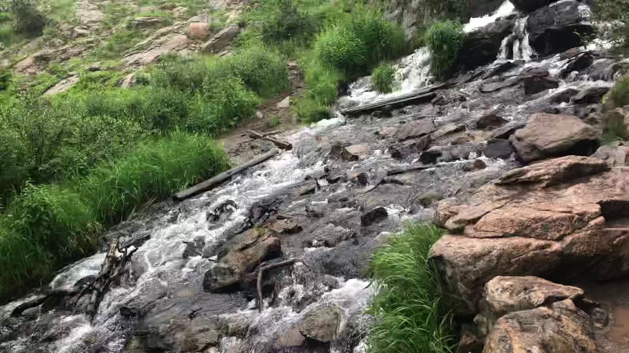 Chad looks at a waterfall @Colorado - YouTube