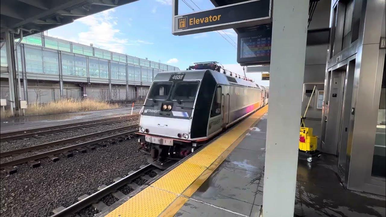 NJ Transit Train arriving at EWR Station - YouTube