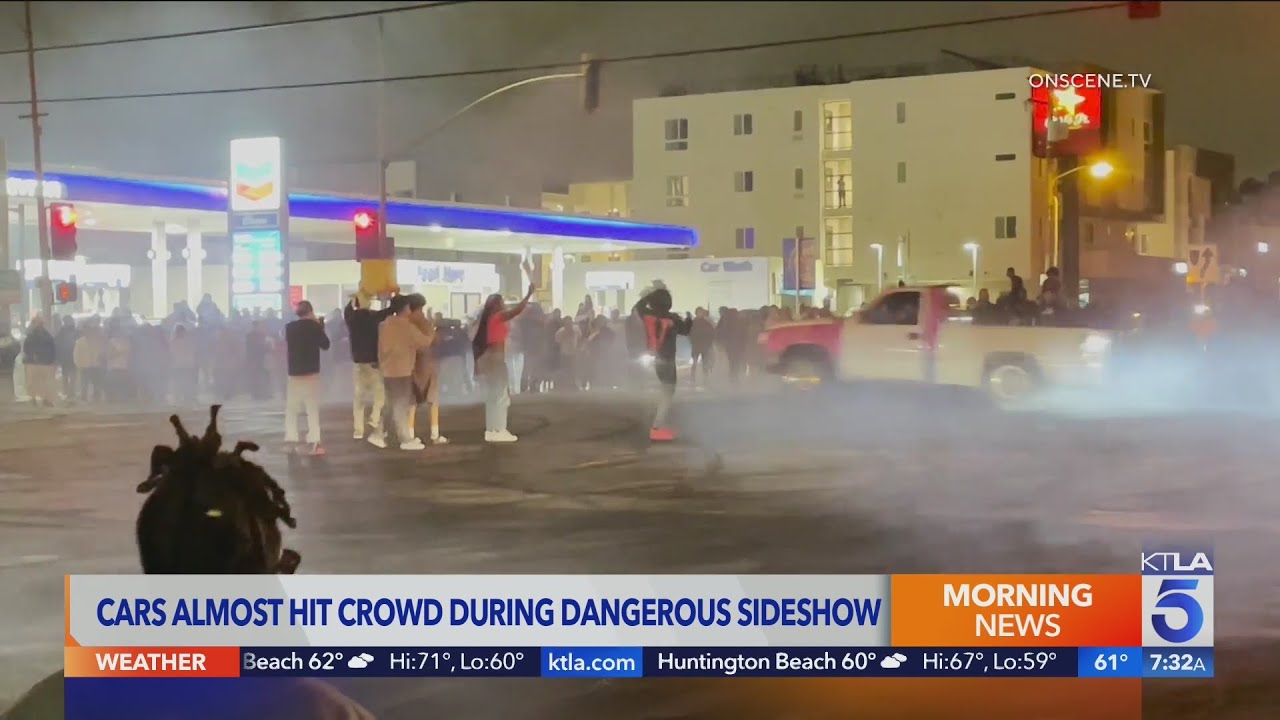 Cars nearly hit crowd during dangerous street takeover - YouTube