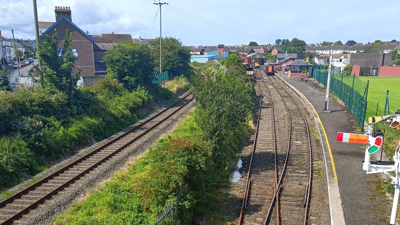 bridge shot of steam train at Whitehead - YouTube