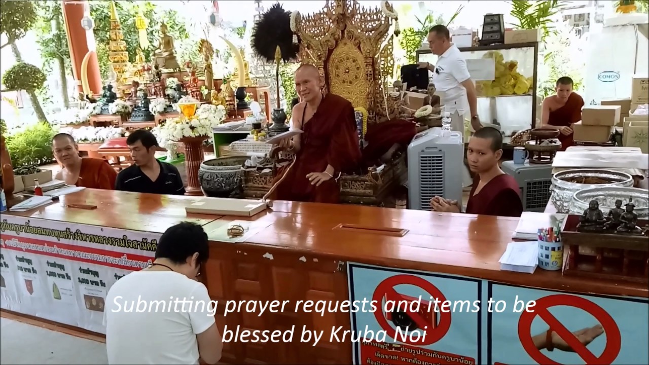 Submitting prayer requests and items to be blessed by Kruba Noi - YouTube