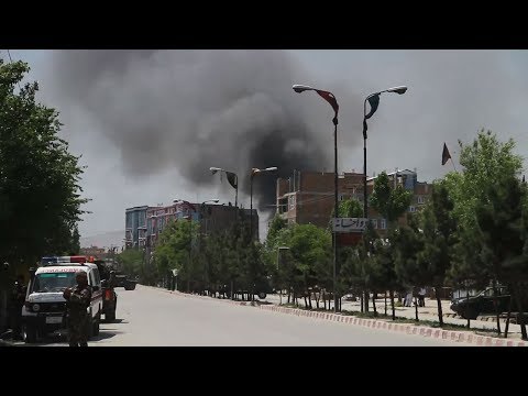 Suicide bombers and gunmen attack Afghan capital