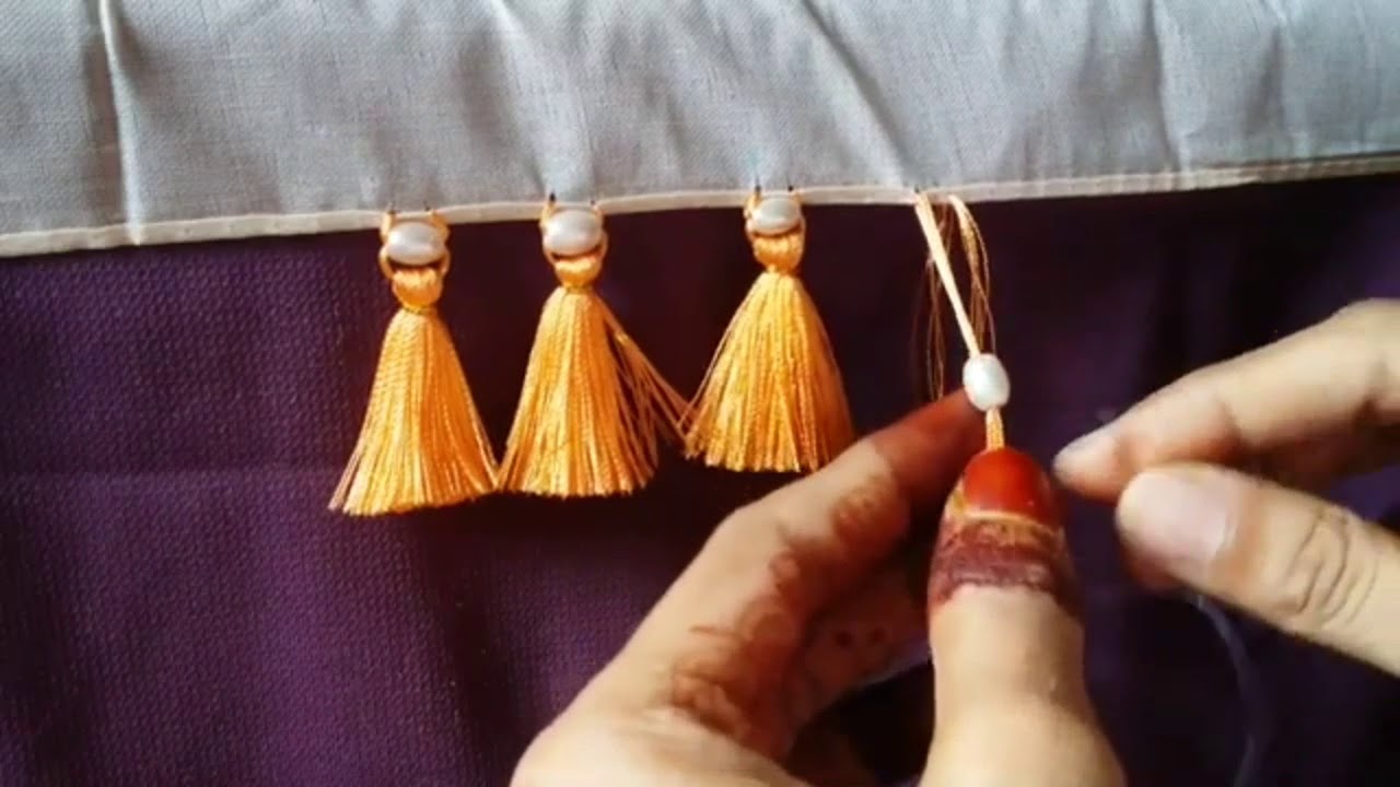 Tassel design using oval shape beads - YouTube