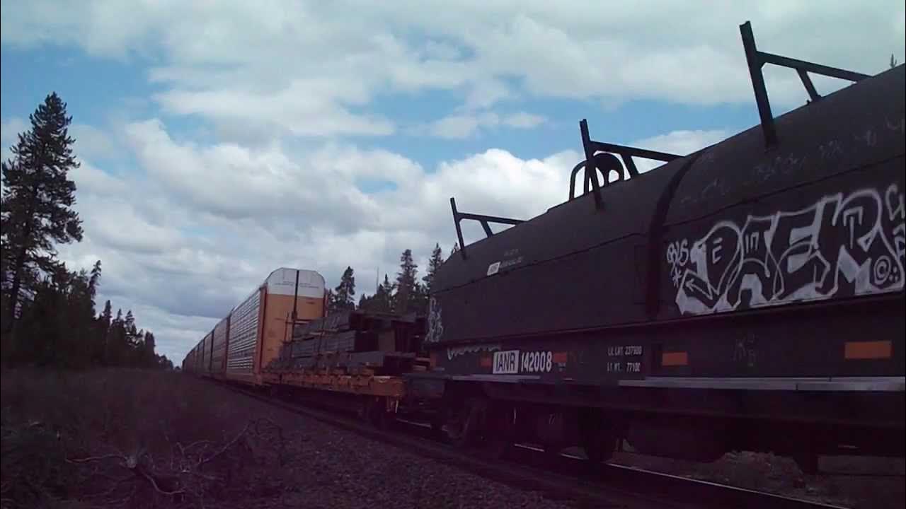 BNSF 4657 NB with CSX 376 - YouTube
