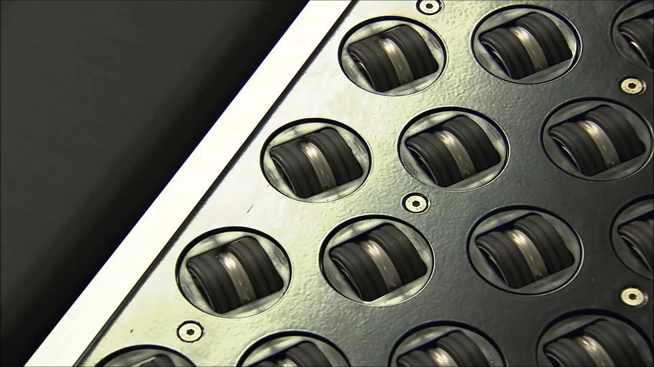 Dematic Steerable Wheel Divert - YouTube