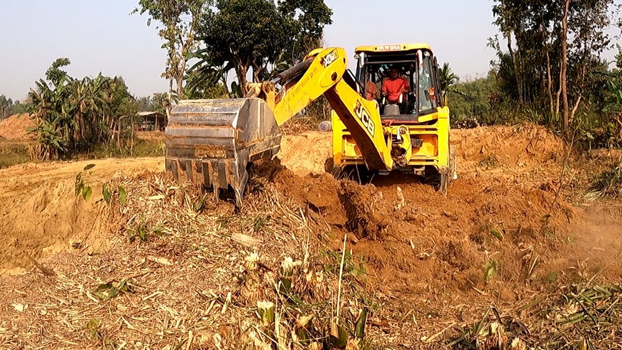 JCB 3DX Machine Uprooting Bamboo And Throwing It Away - YouTube