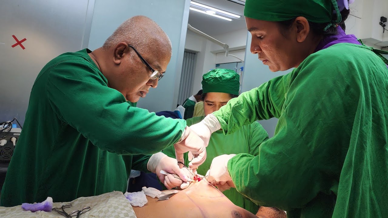 Gynecomastia live Surgery - YouTube