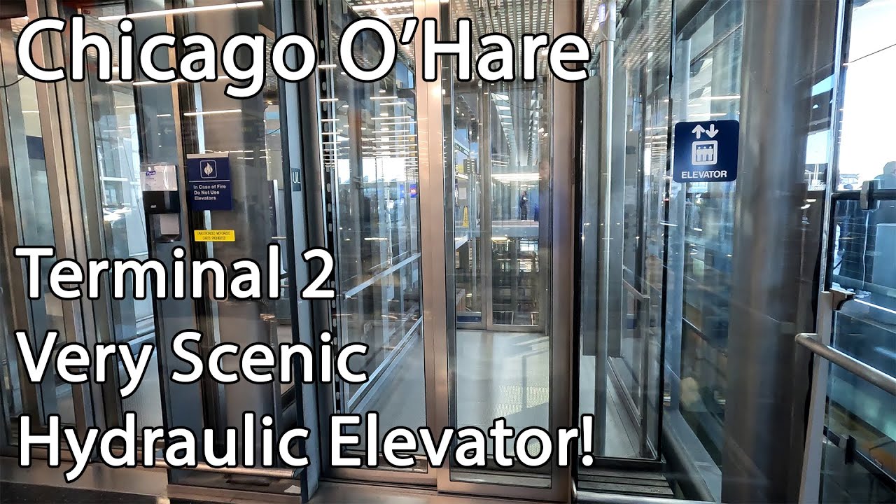 An Almost Completely Glass Elevator at the Chicago O'Hare Airport ...