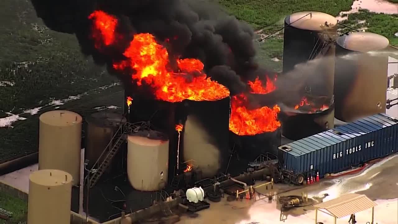 WATCH: Crews battle large oil tank fire in Amber - YouTube