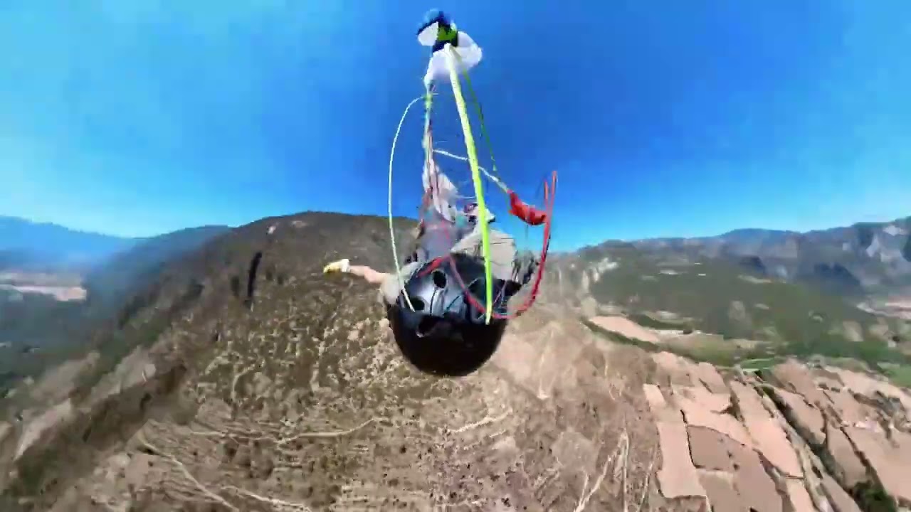 Paraglider narrowly avoids death after parachute fails to open - YouTube