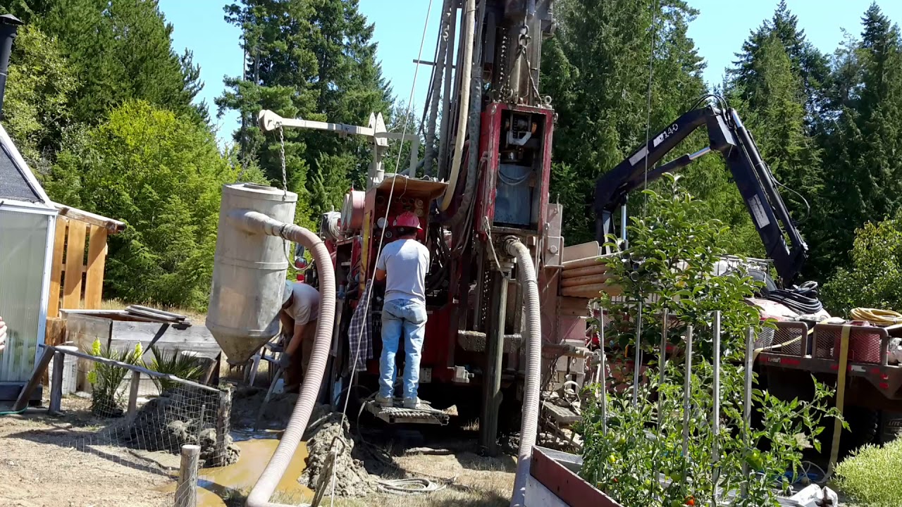 Pushing Soil Out of Ground by Pumping Water and High-pressure Air Down ...