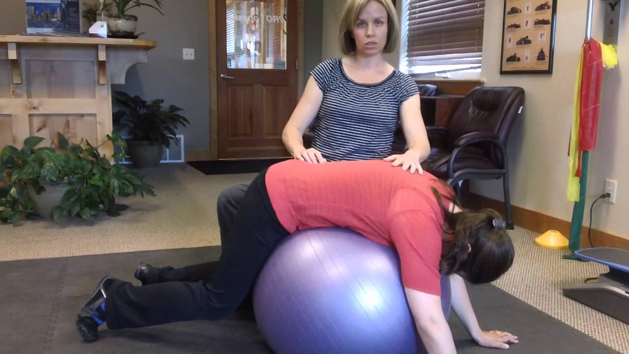 Static Low Back Stretch Using a Physioball | Pro Physio - YouTube
